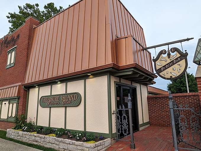 The copper-topped exterior of Treasure Island Supper Club stands like a time capsule in Moraine, promising culinary adventures that have nothing to do with pirates.