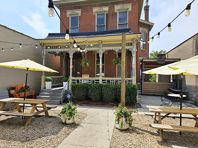 String lights and picnic tables create the perfect backdrop for the BBQ magic that awaits hungry visitors.