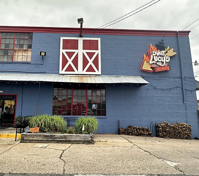 The blue exterior with red barn doors isn't just eye-catching&mdash;it's a smoke signal to BBQ lovers that something magical happens inside these walls.