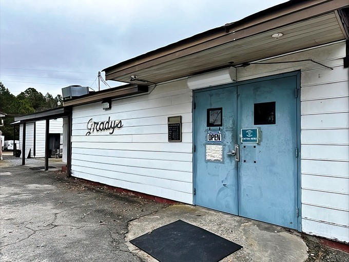 That blue door might as well be a portal to pork paradise – no fancy facade needed when the food speaks volumes.