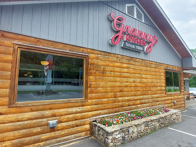 The rustic log cabin exterior of Granny's Kitchen promises what every road-weary traveler hopes for&mdash;authentic mountain cooking that doesn't need fancy frills to impress.