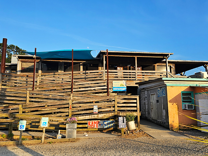 The approach to seafood nirvana looks like it was assembled by driftwood-collecting mermaids with architectural ambitions. Pure Lowcountry magic.