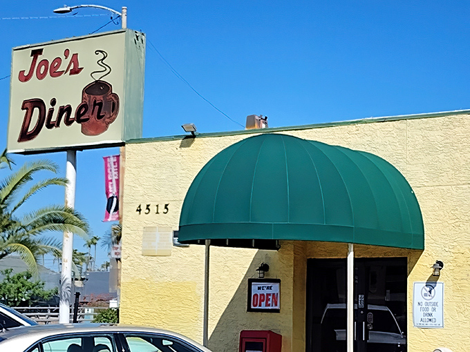 That iconic yellow building with the green awning isn't trying to win architectural awards&mdash;it's saving all its energy for what really matters: the food inside.