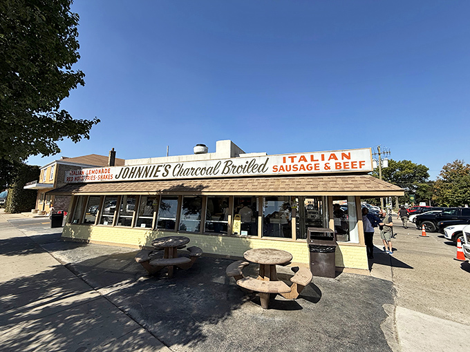 The yellow-brick beacon of beef salvation stands proudly on North Avenue, its vintage sign promising charcoal-broiled delights to patient pilgrims.