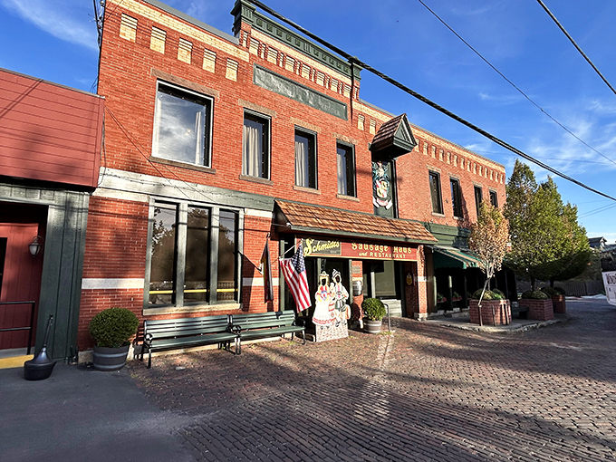 The charming storefront beckons with old-world appeal, complete with a festive cutout of traditional German figures that practically shouts "Willkommen!" to hungry passersby.