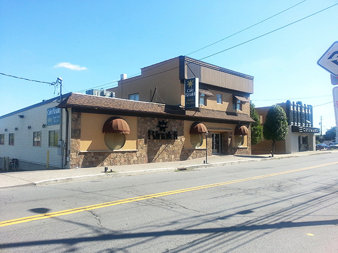 The unassuming exterior of Café Rinaldi belies the culinary treasures within. Those copper awnings are like a beacon to food lovers in the know.