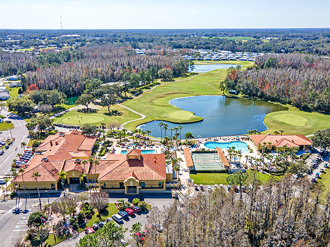 Bird's eye view reveals the master plan: golf, lakes, and zero traffic jams in sight.