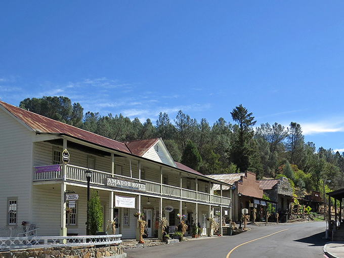 The Amador Hotel's weathered facade tells stories of prospectors and dreamers who once roamed these very boardwalks.