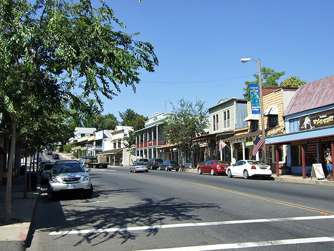 Another view of downtown Angels Camp showcases the walkable streetscape where modern life unfolds against a backdrop of 19th-century buildings.