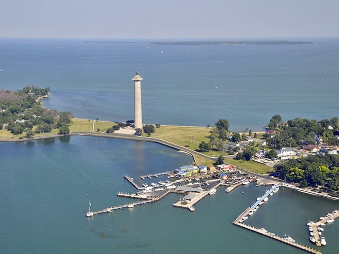 Aerial paradise! Put-in-Bay's harbor sparkles like a sapphire, dotted with boats and framed by Perry's Monument&mdash;the Midwest's answer to island getaways.