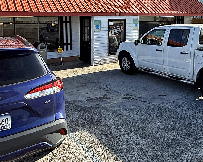 The unassuming exterior of Ruth's Family Restaurant, where that glowing "OPEN" sign promises more culinary joy than most fancy neon establishments ever deliver.