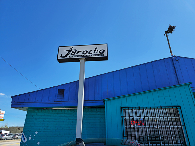 That turquoise exterior isn't shy about announcing there's serious Mexican seafood happening inside this Kansas City gem.