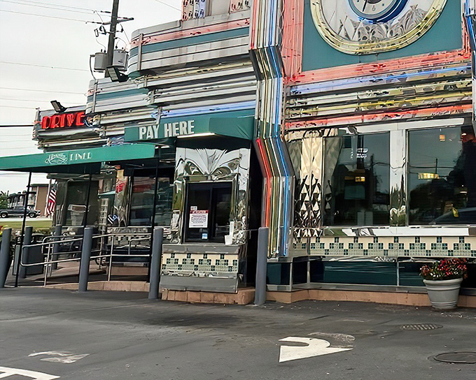 By day, the Marietta Diner's retro facade stands ready for action, like a classic Cadillac parked on Cobb Parkway waiting for its next adventure.
