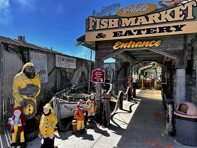 The unassuming entrance to Phil's Fish Market & Eatery promises seafood treasures within, like finding Neptune's secret dining room hiding in plain sight.