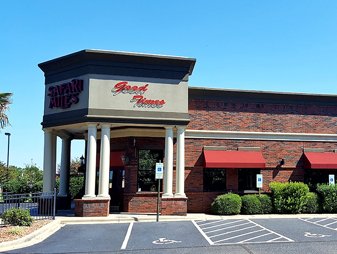 Those iconic red letters and tropical palms stand guard at the entrance, promising culinary adventures more exciting than any jungle expedition.