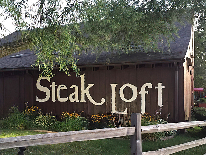 That rustic wood-paneled exterior practically whispers "great steak inside" &ndash; and it's not lying to you.