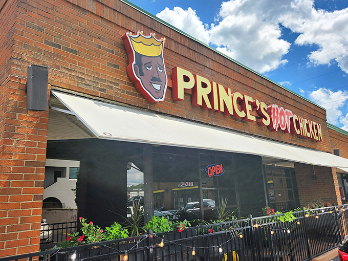 That iconic crown logo isn't just branding&mdash;it's a well-earned symbol of royalty in Nashville's culinary landscape. The "OPEN" sign might as well say "Enter at your own delicious risk."