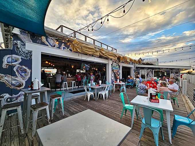 The outdoor deck at Half Shell Dockside&mdash;where string lights, sea breezes, and the promise of fresh seafood create Florida dining perfection.