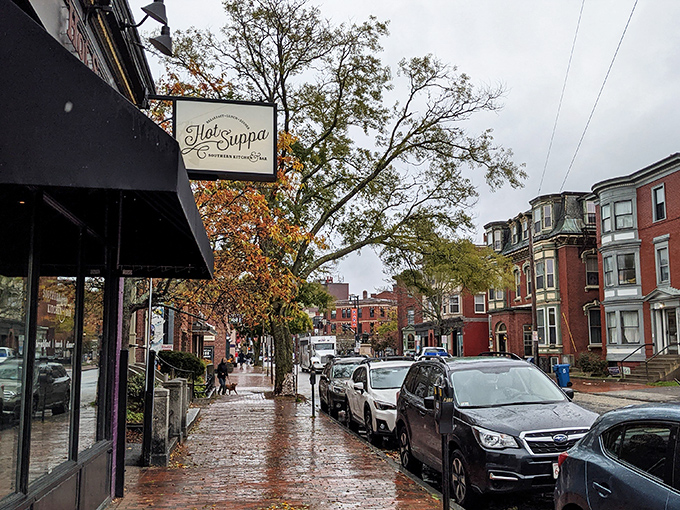 Even on a rainy Portland day, Hot Suppa's welcoming sign promises comfort food that makes weather woes disappear faster than pancakes at a lumberjack convention.