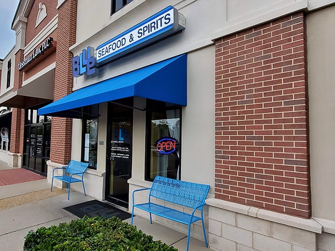 The unassuming storefront might fool you, but that bright blue awning is basically a seafood bat-signal for those in the know.