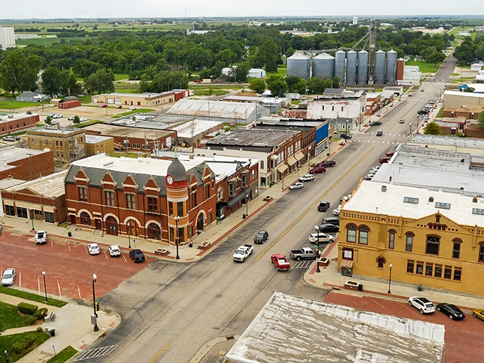 Main Street Winfield basks in golden Kansas sunshine, offering the kind of unhurried pace where shopkeepers still greet you by name.