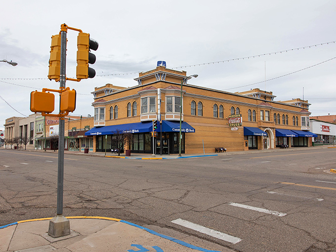 Historic buildings stand proudly at a Las Vegas, NM intersection, where time seems to move at the perfect retirement pace.