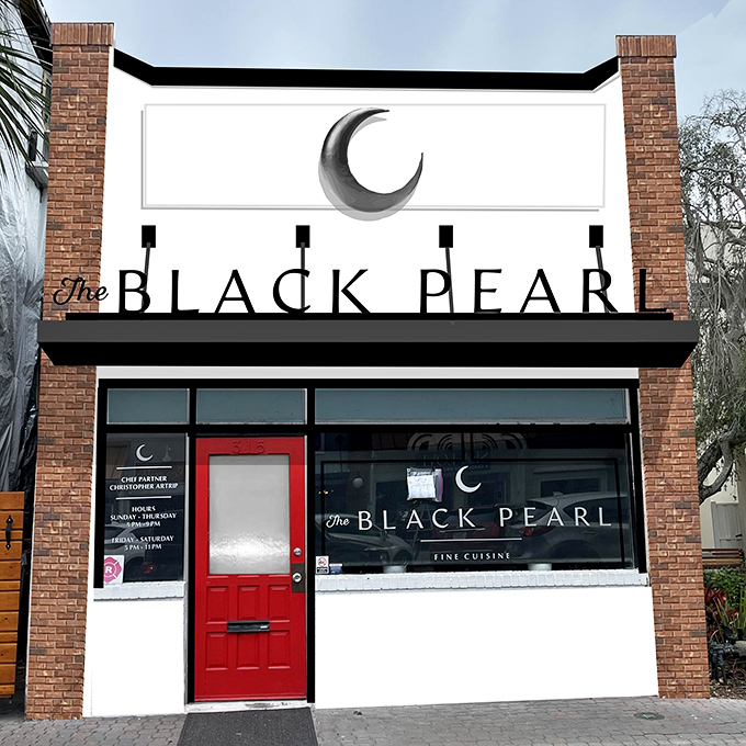 The Black Pearl's striking fa&ccedil;ade with its iconic red door stands like a culinary beacon in downtown Dunedin &ndash; an unassuming exterior that belies the gastronomic treasures within.