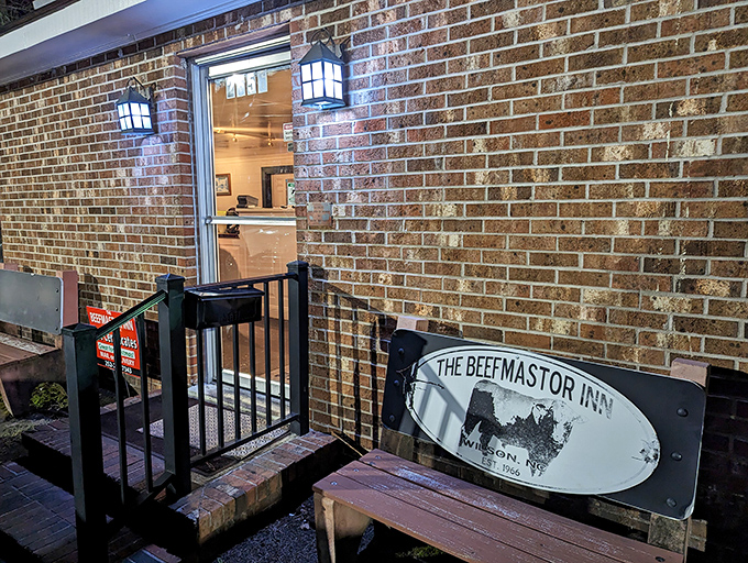 The unassuming entrance to flavor paradise. This brick facade with its modest sign hides one of North Carolina's most celebrated culinary treasures.