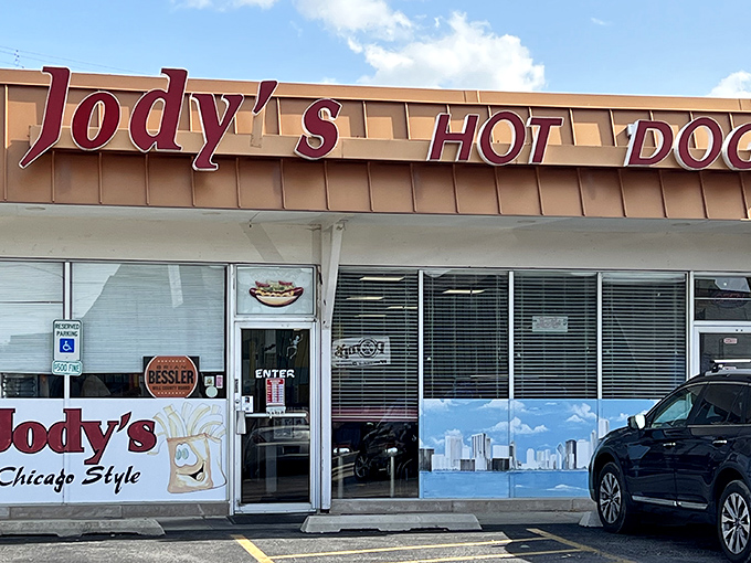 Jody's bold red signage against the copper-toned exterior isn't just a restaurant front&mdash;it's a beacon of hope for the hot dog deprived.