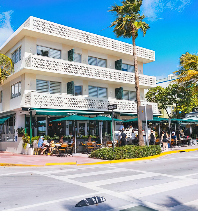 The iconic white Art Deco fa&ccedil;ade of News Cafe stands proudly on Ocean Drive, where Miami's vibrant energy meets European caf&eacute; culture.