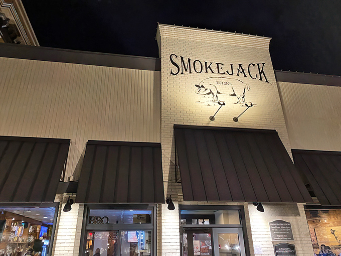 The white brick facade of Smokejack BBQ glows like a beacon for hungry travelers. At night, that illuminated pig sign practically winks at you.