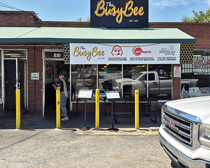 The unassuming storefront of Busy Bee Caf&eacute; has welcomed soul food pilgrims since 1947. Yellow poles stand guard like sentinels protecting Atlanta's culinary treasure.