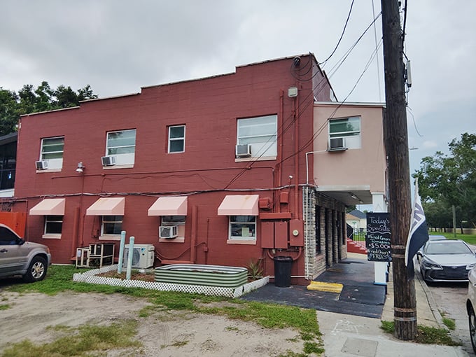 The unassuming brick exterior of Nikki's Place in Orlando's Parramore district proves once again that culinary treasures don't need flashy neon to announce their greatness.