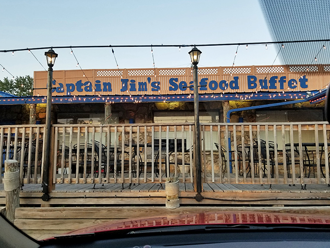 Evening brings a magical glow to Captain Jim's deck, where string lights twinkle like stars guiding hungry sailors to port.