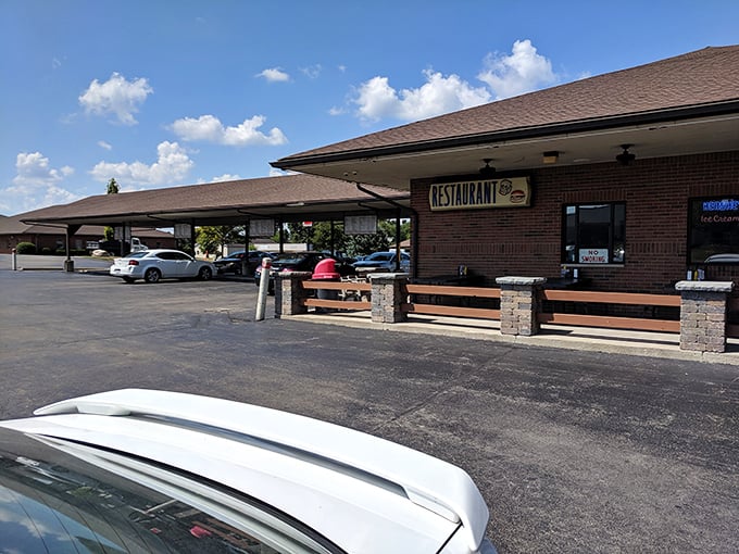 The classic brick exterior of B & K Root Beer Stand beckons with its covered parking spots&mdash;a time machine disguised as a restaurant in Troy, Ohio.