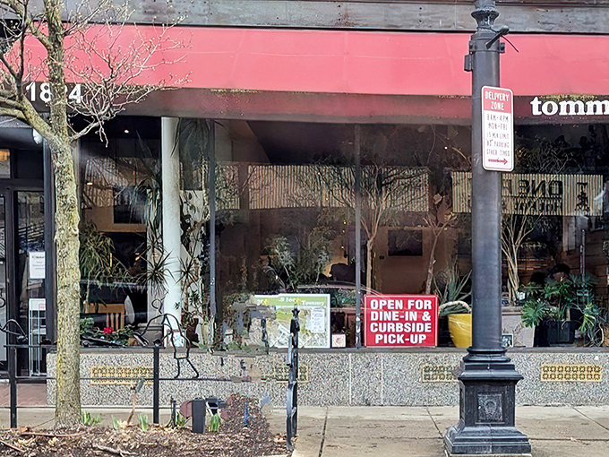 Tommy's iconic red awning beckons food lovers to this Cleveland Heights institution like a culinary lighthouse on Coventry Road.