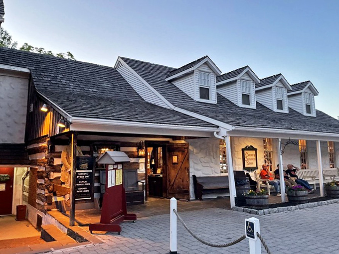 History stands proudly in stone and timber at Dobbin House, where the American flag waves as if to say, "Come in, the prime rib is waiting!"