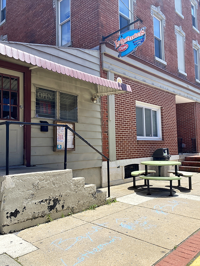 The iconic blue sign beckons hungry travelers like a lighthouse for the breakfast-deprived. Small-town charm with big-time flavor potential.