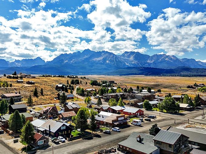 Stanley's main street, where the population sign could read: "Population: 69 humans, 10,000 elk, and countless dreams of mountain escape."