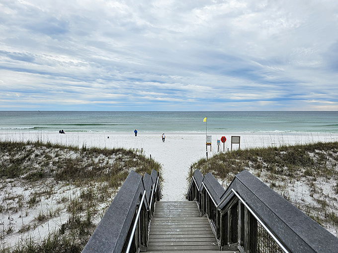 The stairway to heaven is made of weathered wood and white sand. Mother Nature's VIP entrance to the Gulf awaits.