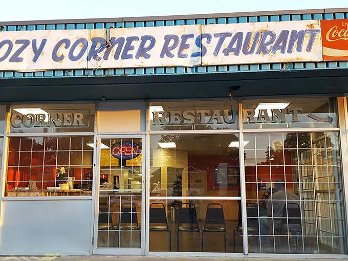 The unassuming storefront of Cozy Corner Restaurant stands as Memphis' barbecue beacon, promising smoky treasures within those humble walls.