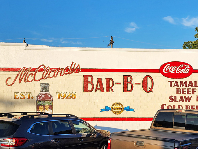 McClard's iconic wall mural proudly announces its barbecue heritage since 1928, a painted promise of smoky delights that's kept generations coming back.