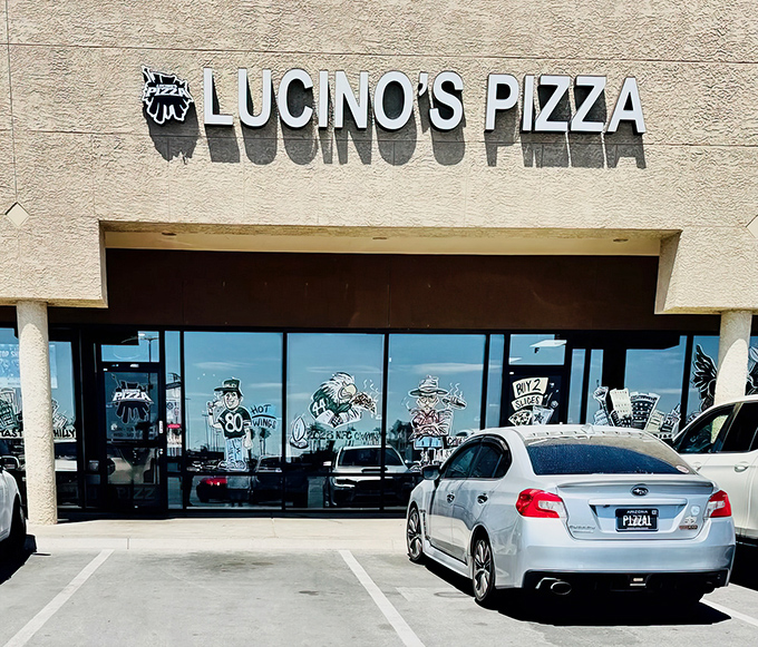 Lucino's Pizza announces itself with understated confidence in a Las Vegas strip mall – proof that culinary treasures often hide in plain sight.