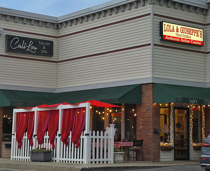 The charming exterior of Lola's beckons like an Italian grandmother insisting you're too skinny. Those red curtains practically whisper "mangia, mangia!"