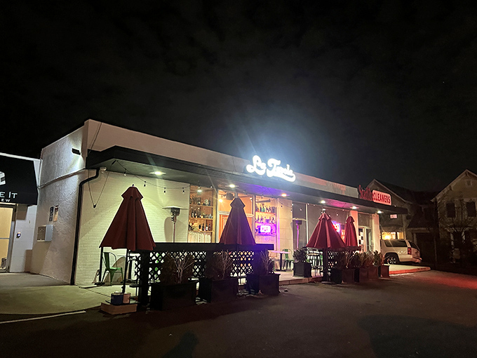 That retro script sign and those planters flanking the entrance are basically saying "come in, we've got carbs."