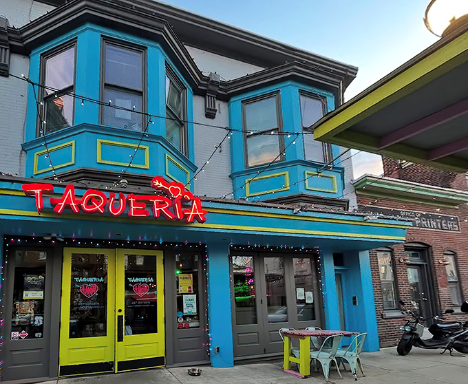 The turquoise and yellow fa&ccedil;ade of Taqueria Amor isn't just a building&mdash;it's a mood-altering device that promises deliciousness awaits inside.