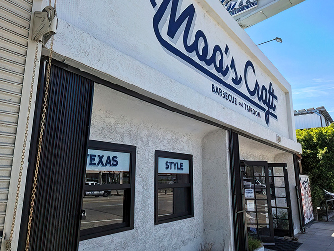 The white facade of Moo's Craft Barbecue announces its Texas-style intentions without pretense&mdash;like a barbecue joint that knows actions speak louder than architecture.