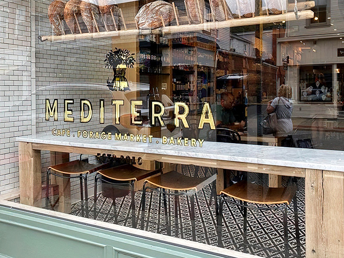 Through the window, golden loaves and tiled floors hint at Europe&rsquo;s caf&eacute; culture&mdash;Mediterra whispers, &ldquo;Slow down, friend. The good life&rsquo;s right here.