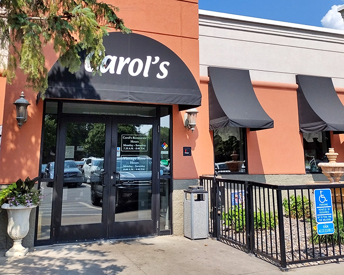Carol's welcoming terracotta exterior stands like a beacon of comfort food promise in Blaine, with those classic black awnings practically whispering, "Come on in, we've got turkey."