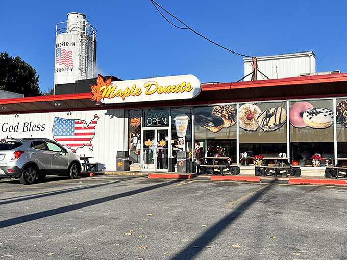 Where donut dreams come true! The water tower proudly declares "American Liberty" above this unassuming temple of fried dough perfection.